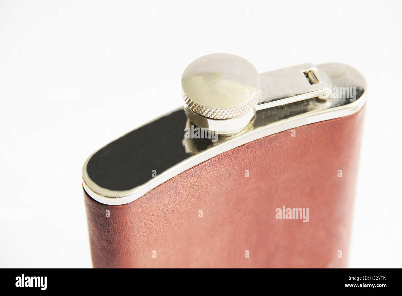 Flask of brown color for alcohol isolated on white Stock Photo - Alamy