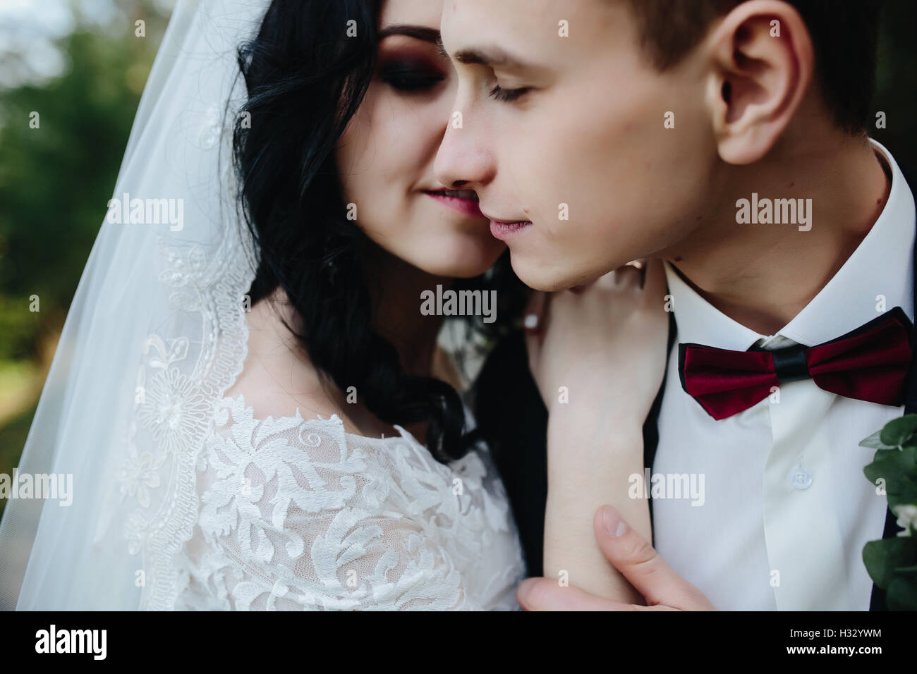 Bridal couple close to each other Stock Photo - Alamy
