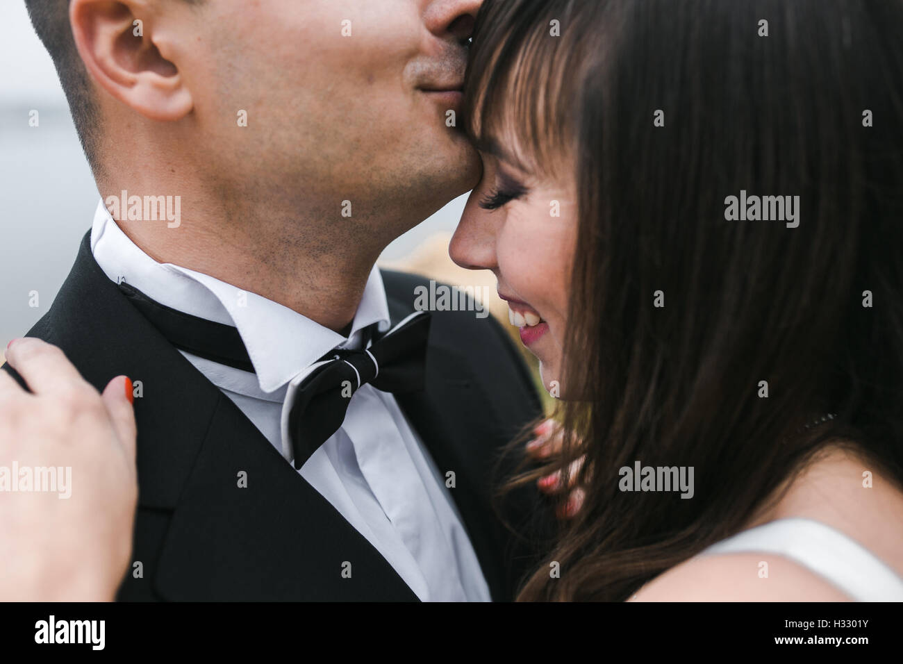 Bridal couple close to each other Stock Photo - Alamy