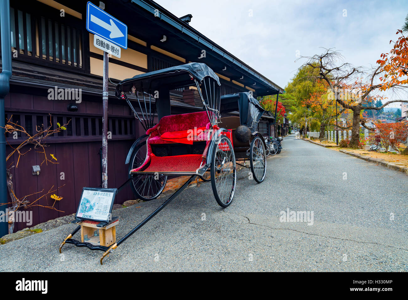 Japanese rickshaw or old style two wheeled passenger cart in Takayama ...