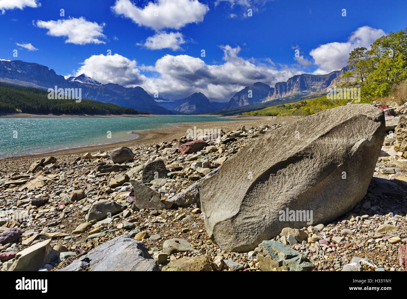 Boulder on the shore highlights wild beauty of Lake Sherburne in ...