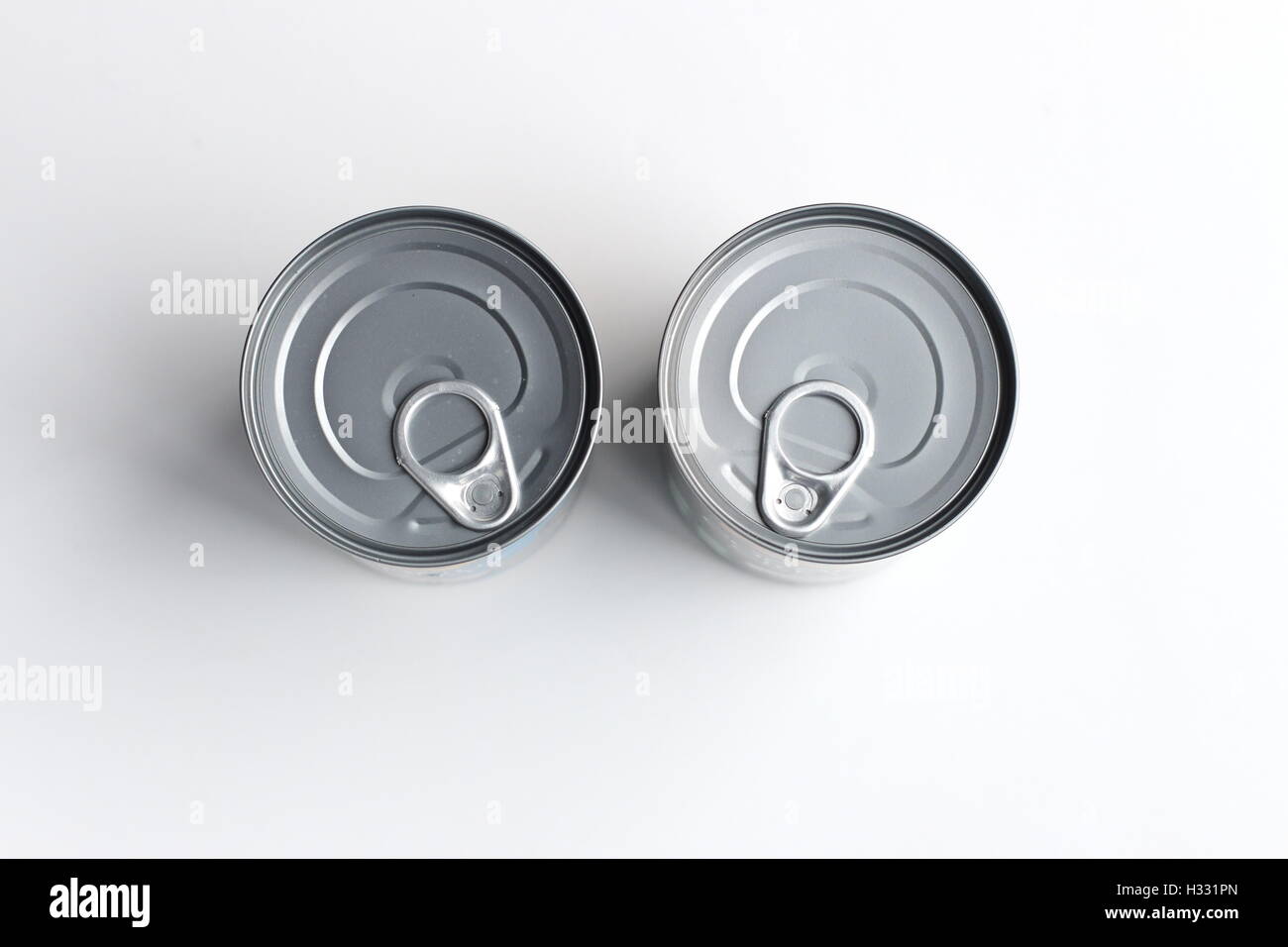 Food can taken from top view against white background Stock Photo - Alamy