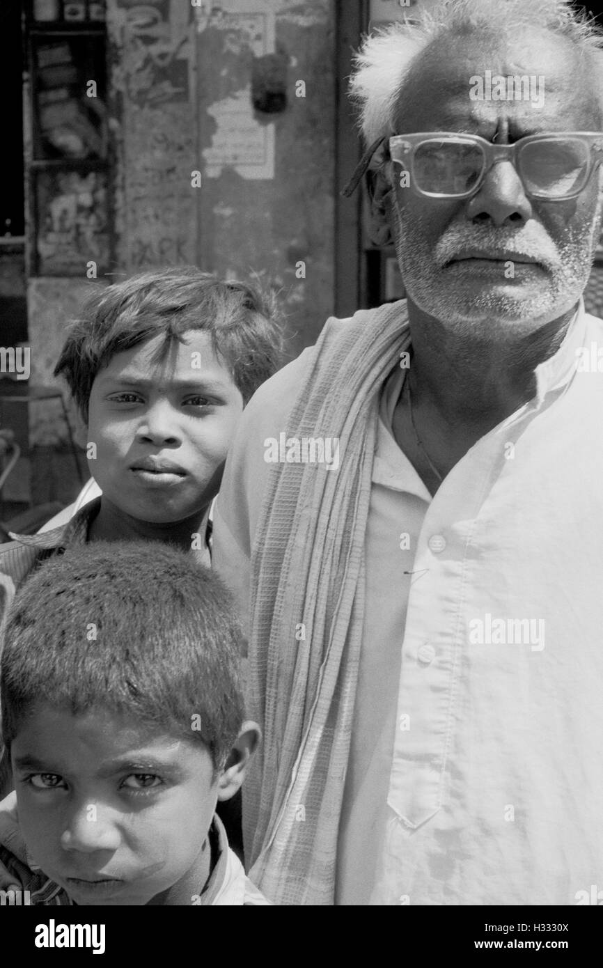 old man and kids india brian mcguire Stock Photo - Alamy