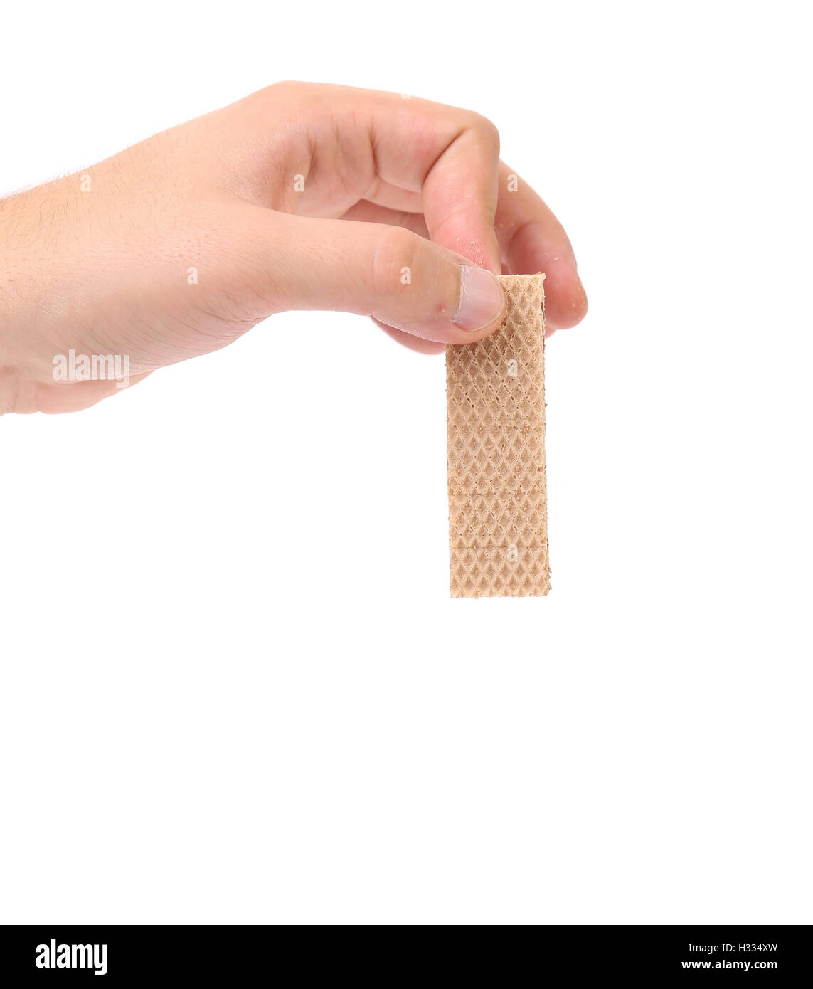 Hand holds tasty waffle Stock Photo - Alamy