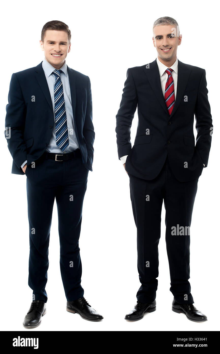 Successful businessmen posing in style Stock Photo - Alamy