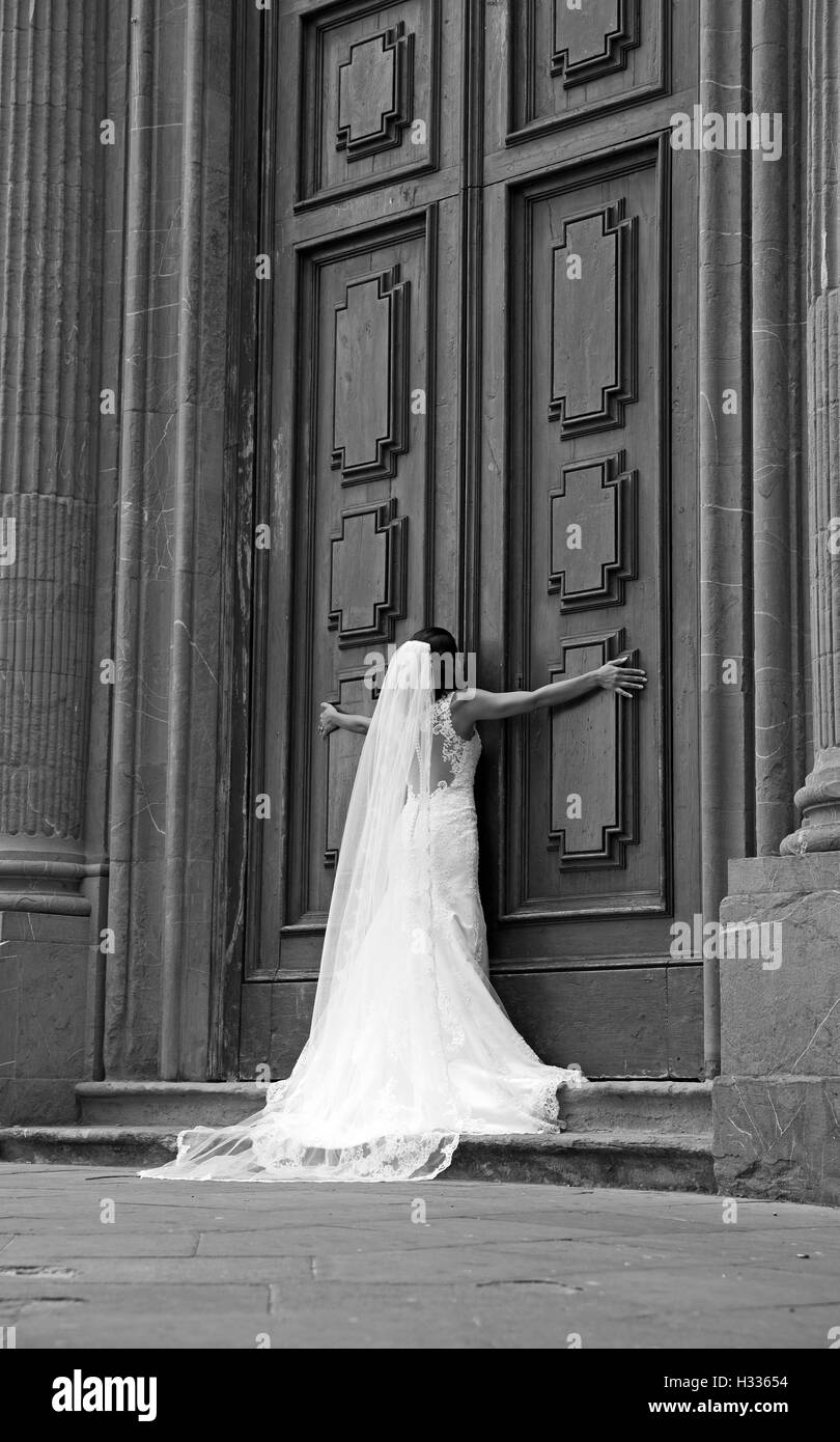 Bride at the church Stock Photo - Alamy