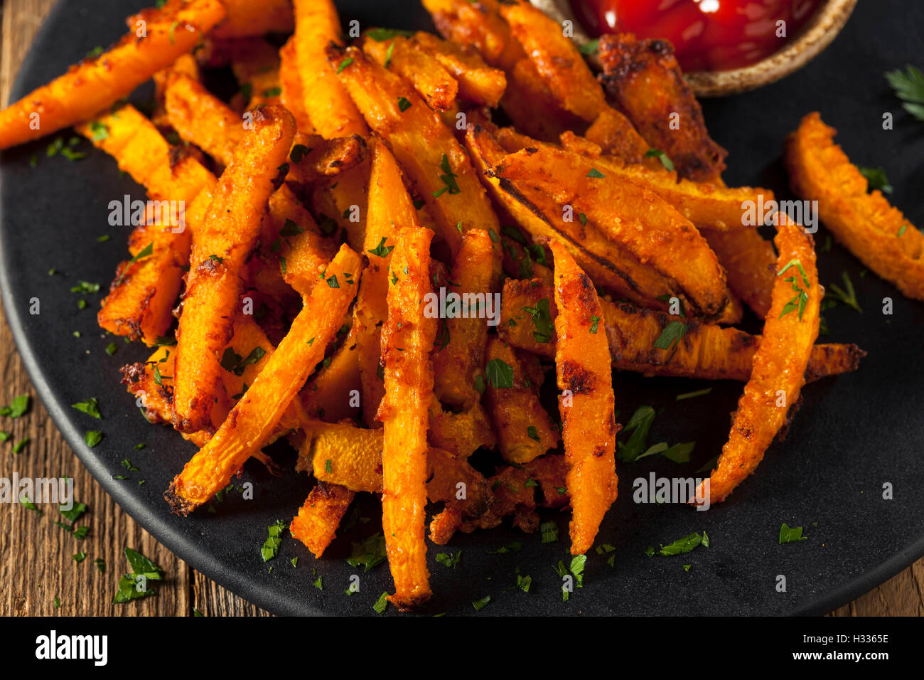 Homemade Organic Pumpkin French Fries with Ketchup Stock Photo - Alamy
