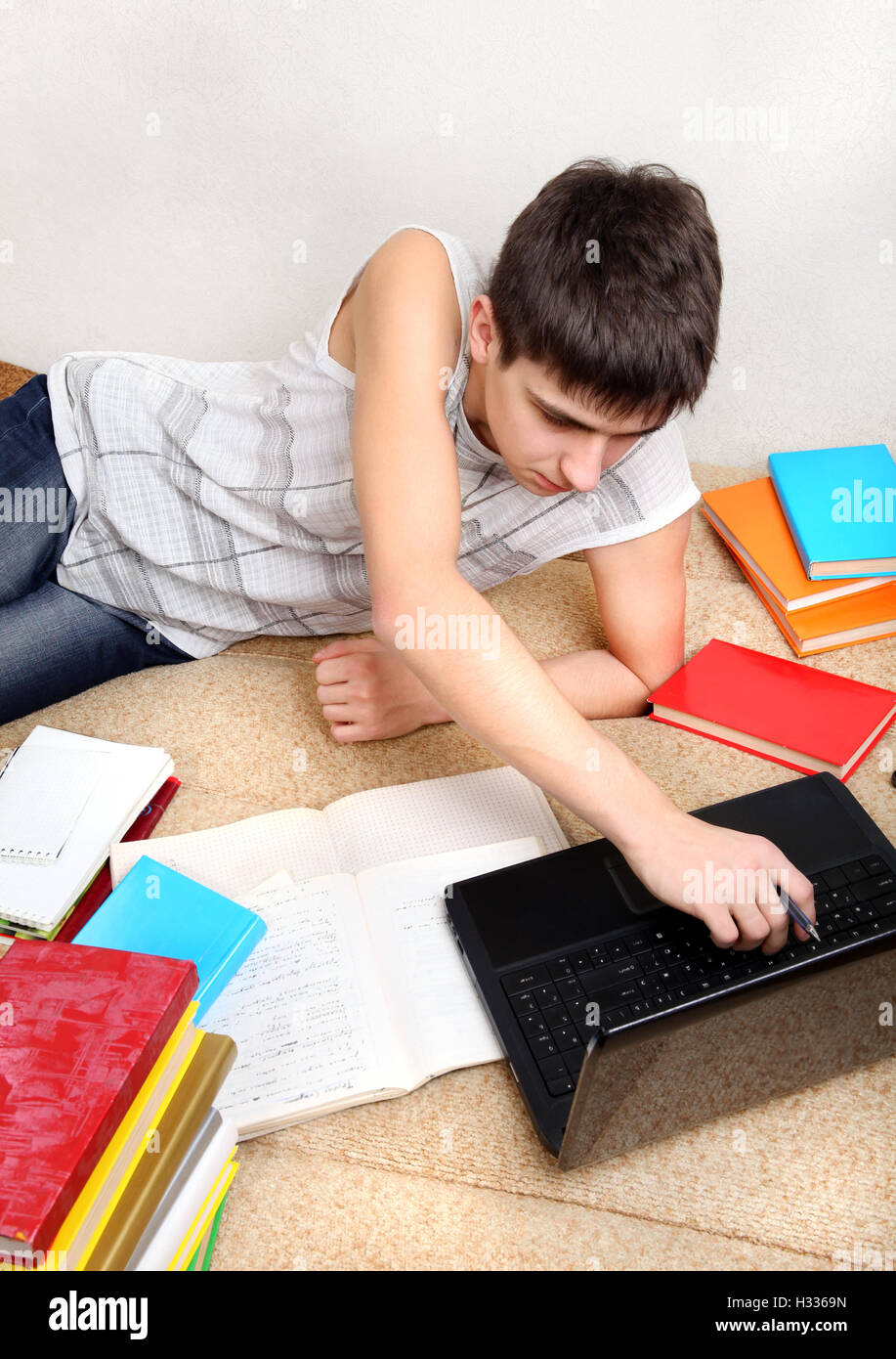 Teenager doing Homework Stock Photo - Alamy