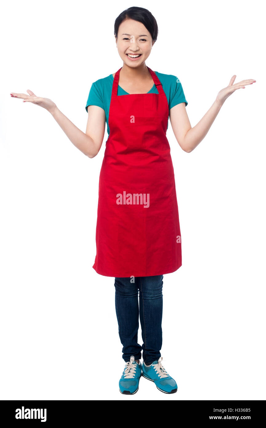 Female chef welcoming you with a smile Stock Photo - Alamy