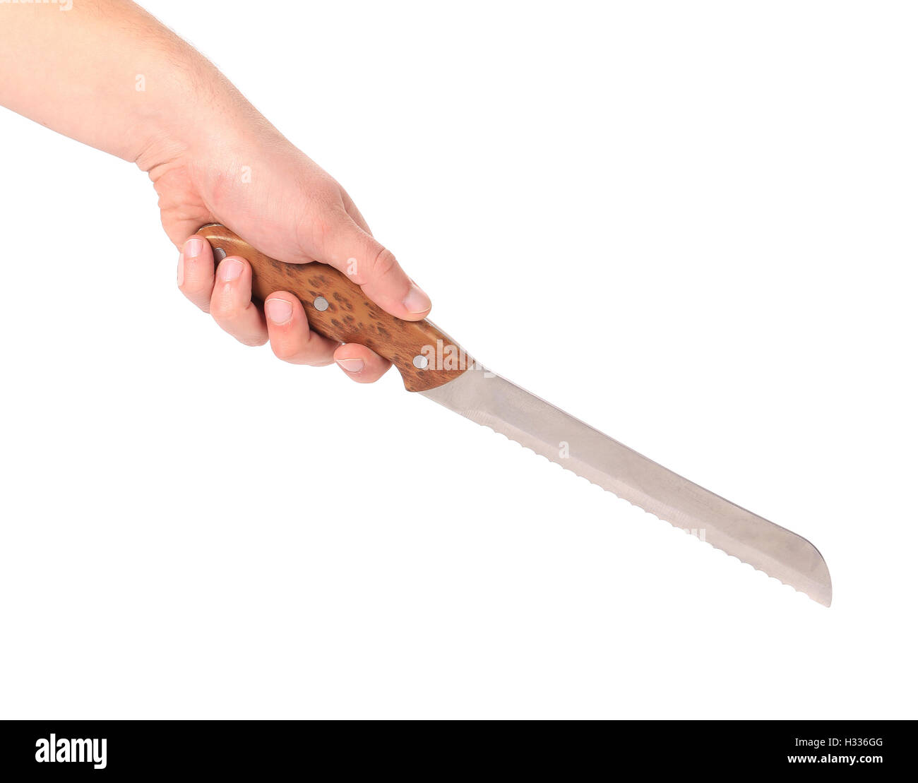 Hand holds knife for bread Stock Photo - Alamy