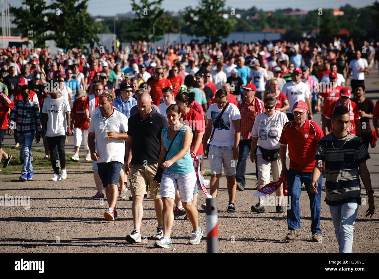 Soccer fans flock out of the stadium Stock Photo - Alamy
