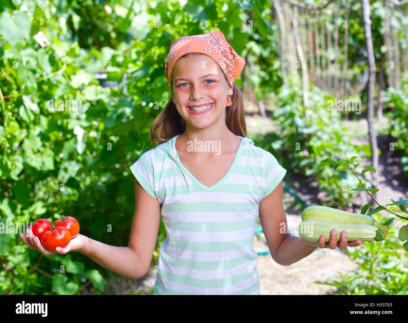 Girl with vegetables Stock Photo - Alamy