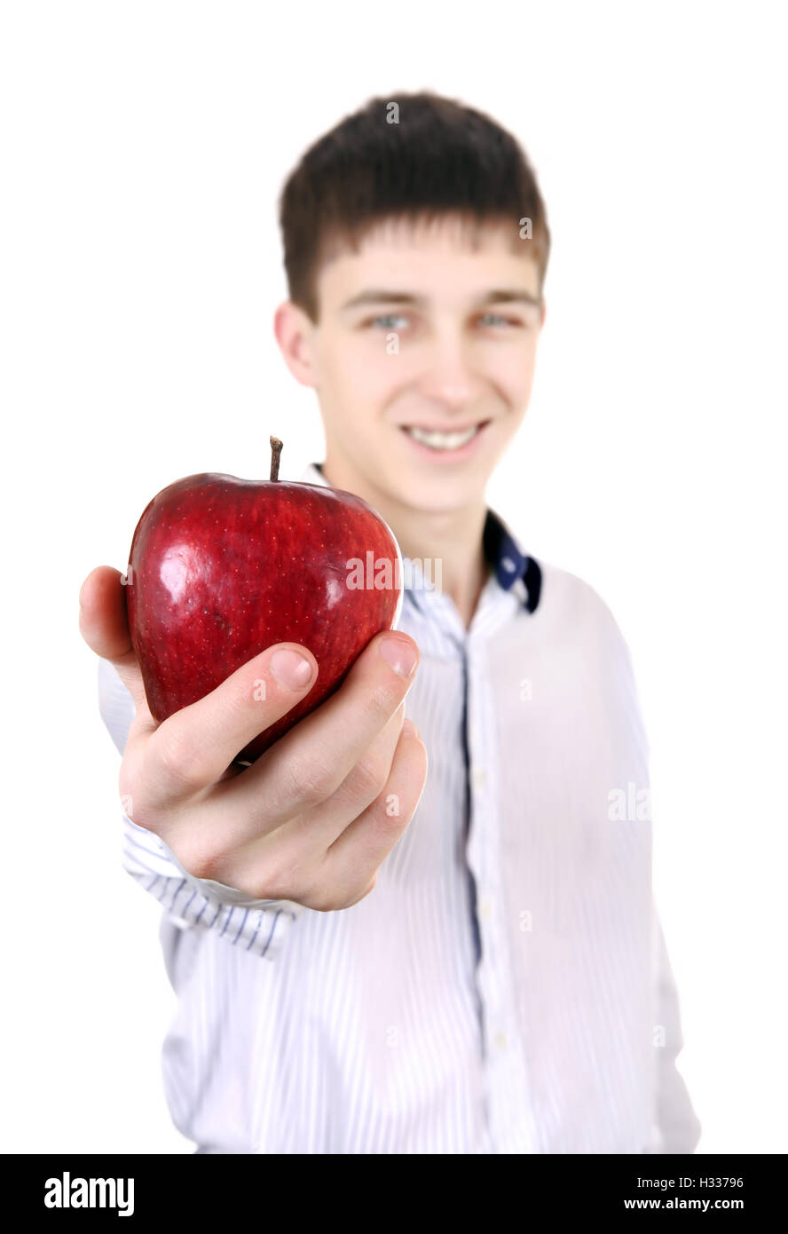 Teenager giving an Apple Stock Photo - Alamy