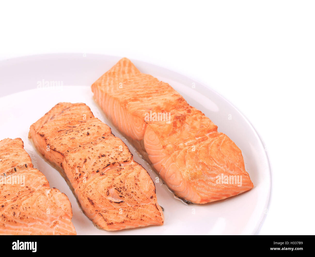 Slices of red fish fillet on plate Stock Photo - Alamy