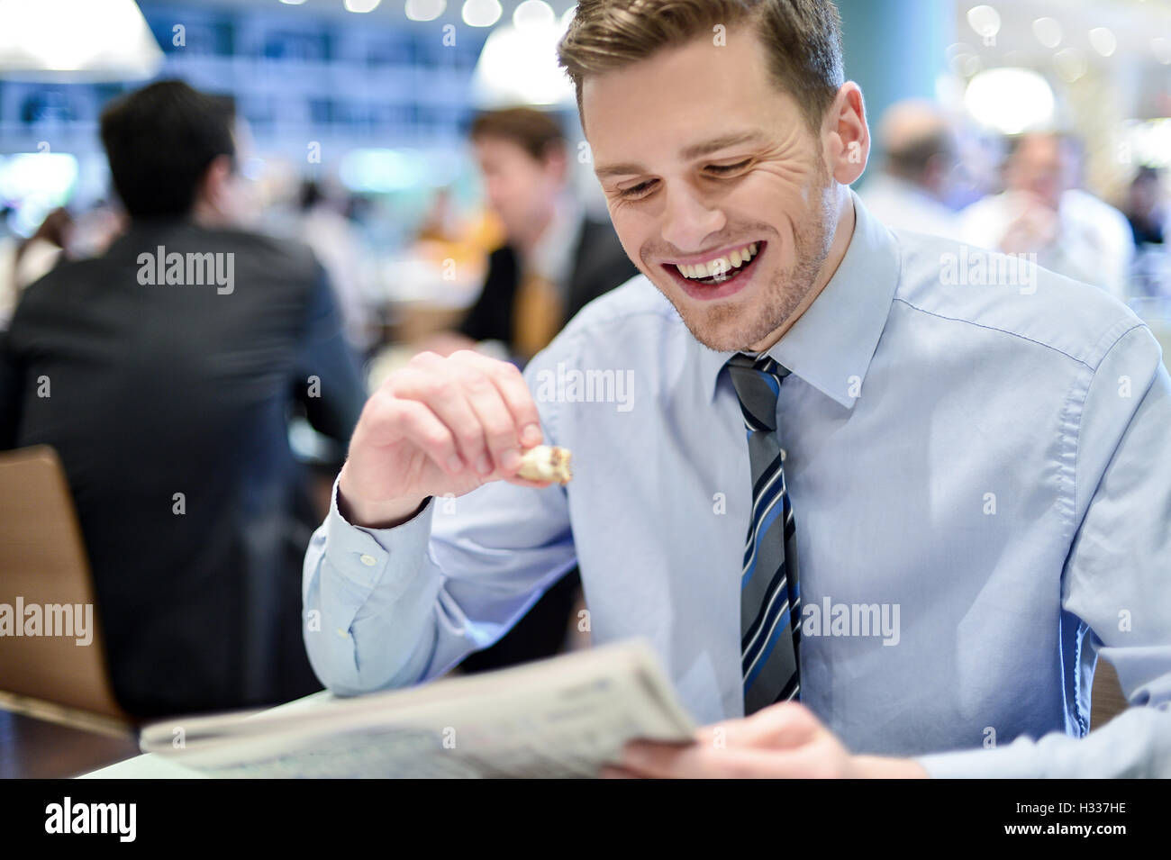 Young ceo newspaper reading hi-res stock photography and images - Alamy