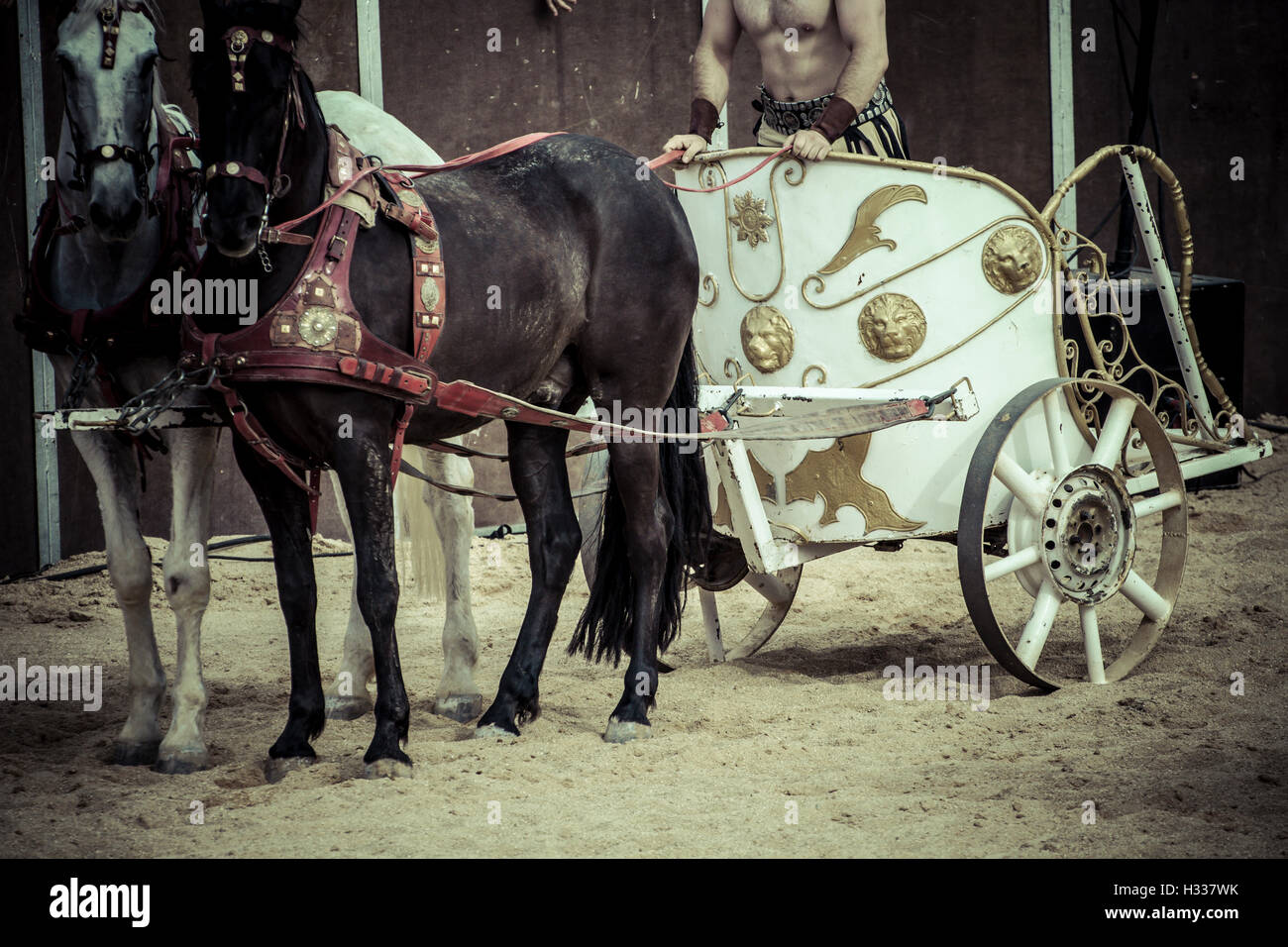 War, Roman chariot in a fight of gladiators, bloody circus Stock Photo ...