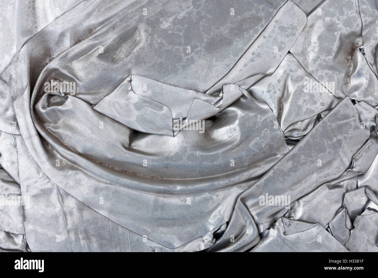 Scrap metal, compressed and deformed, sheet metal waste from industrial ...