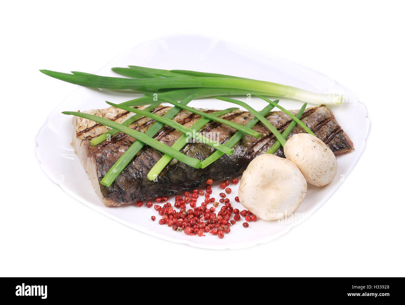 Grilled fish with green onions Stock Photo - Alamy
