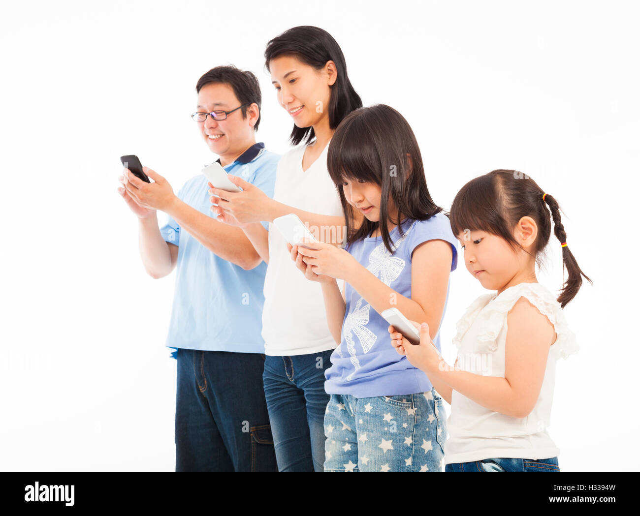 happy family touching the smart phone Stock Photo - Alamy