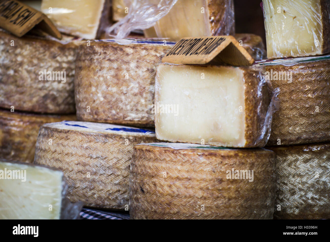 batch of cheese in a medieval fair, artisan cheese Stock Photo - Alamy