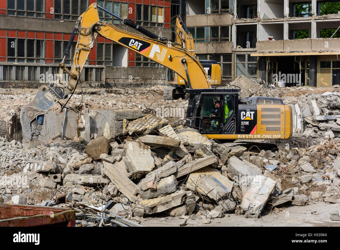 Demolition work, digger in rubble, Dresden, Germany Stock Photo - Alamy