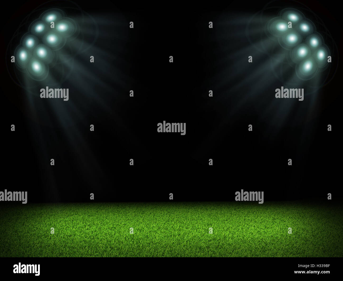 Night football arena illuminated by spotlights Stock Photo - Alamy
