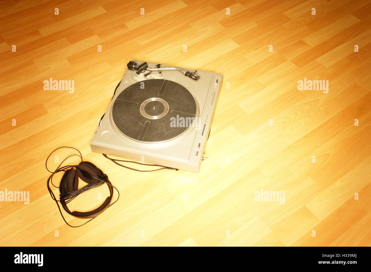 Turntable on a wooden floor Stock Photo - Alamy