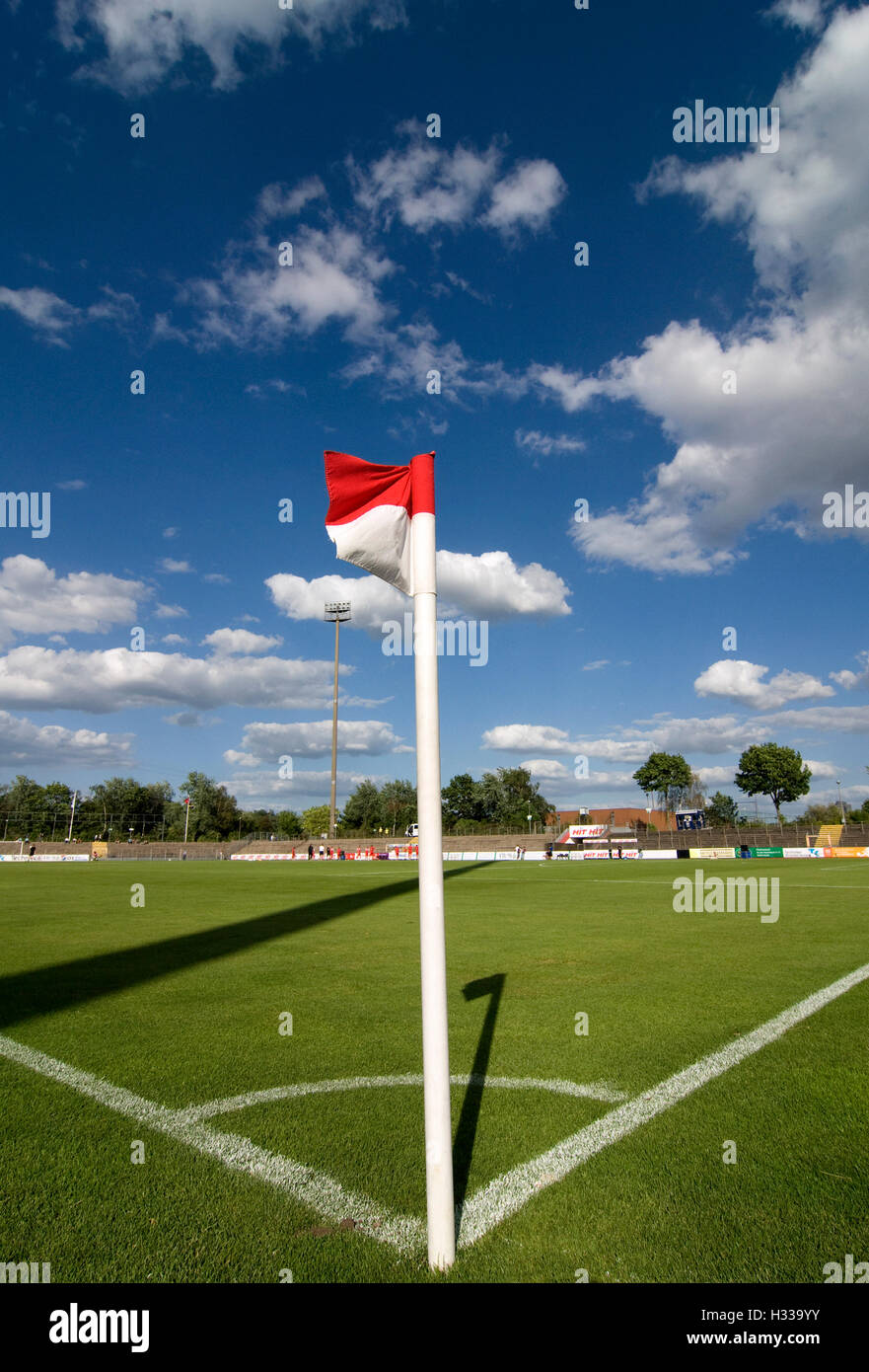 Football, corner flag, blue sky, white clouds and the Cologne ...