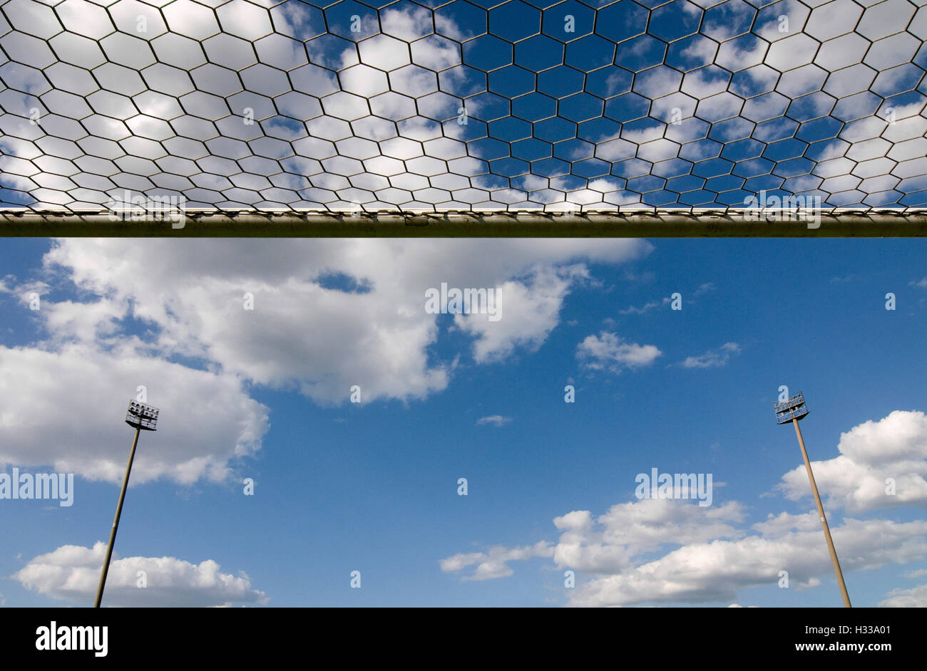 Football, goal, detail, blue sky, white clouds and the Cologne ...