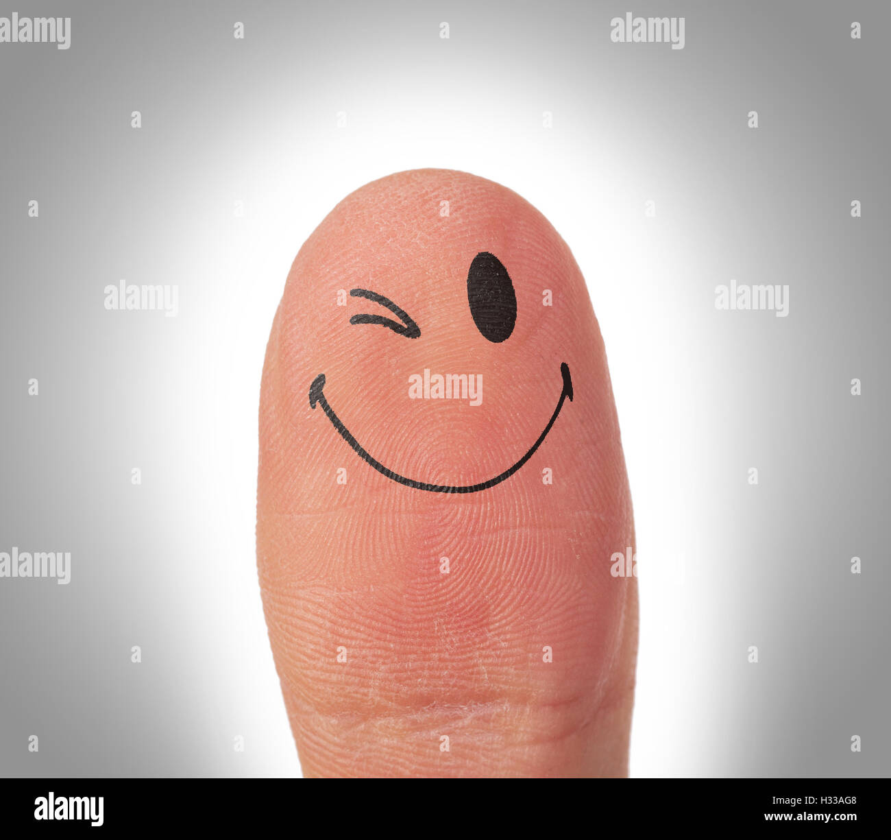 Female thumbs with smile face on the finger Stock Photo - Alamy