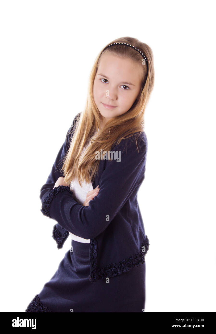 Cute schoolgirl in uniform isolated Stock Photo - Alamy