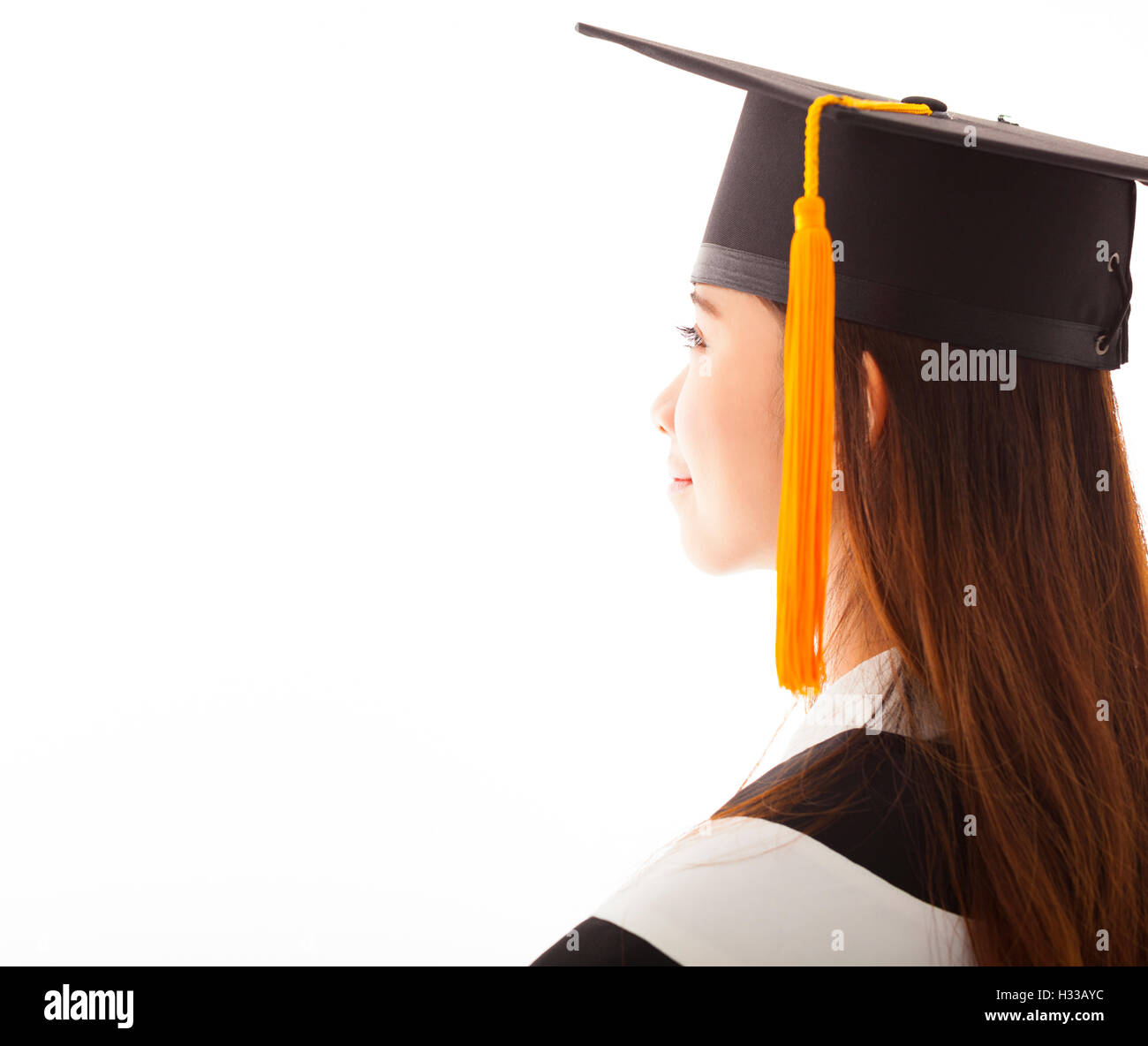 pretty female graduation is thinking future Stock Photo - Alamy