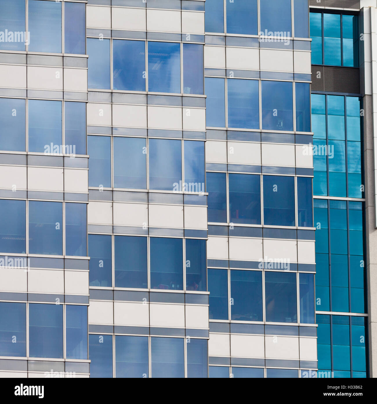 Modern glass-walled highriser building facade Stock Photo - Alamy