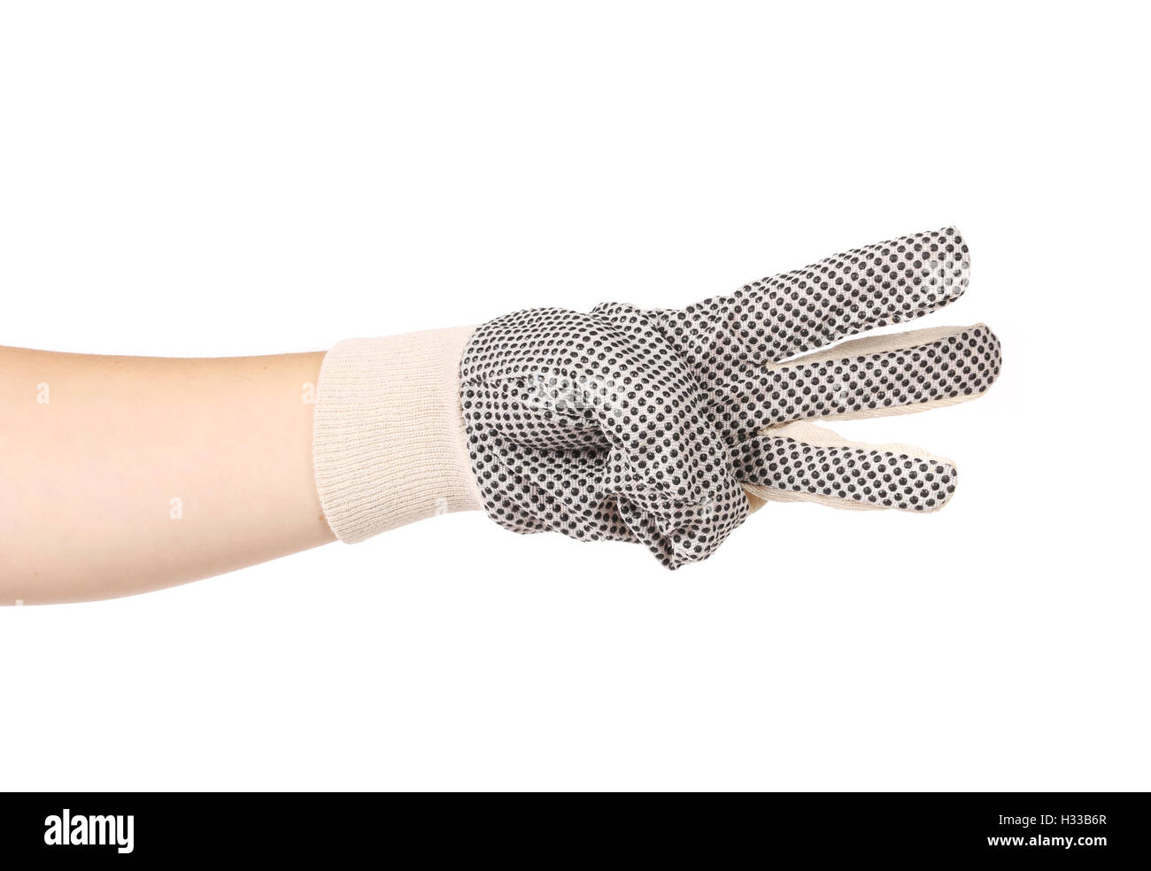 Hand in gloves shows three Stock Photo - Alamy