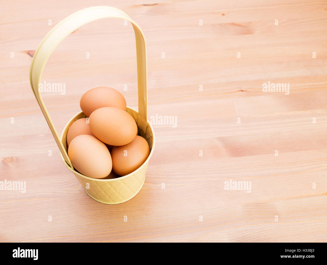 Egg in bucket Stock Photo - Alamy