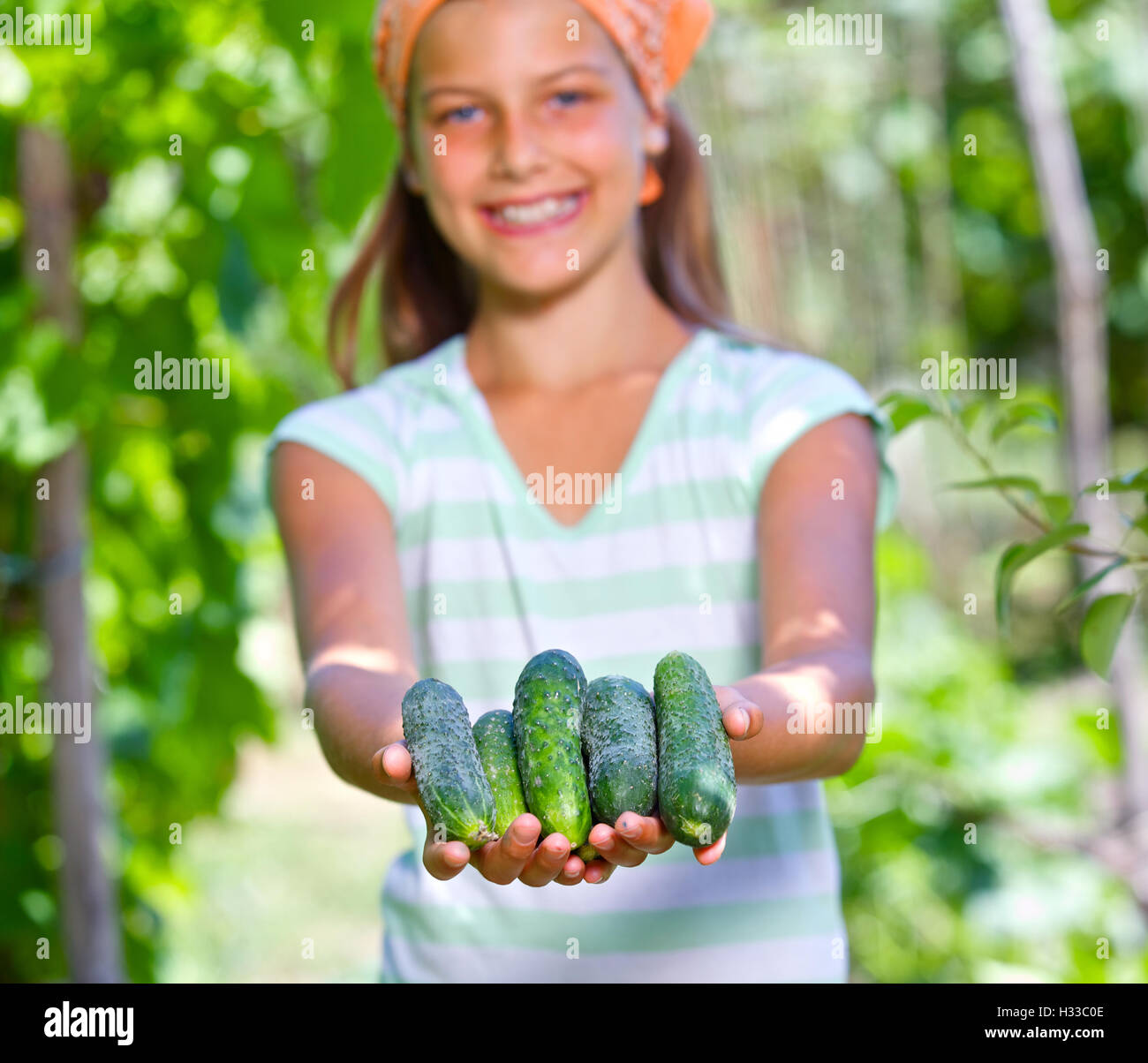 Girl with vegetables Stock Photo - Alamy