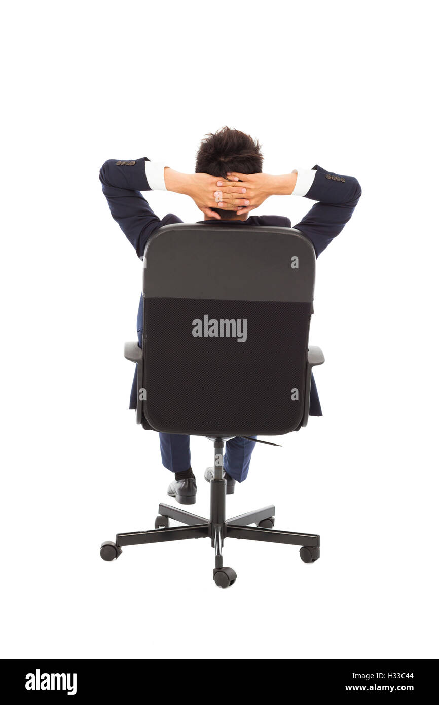 relaxing successful businessman leaning back Stock Photo - Alamy