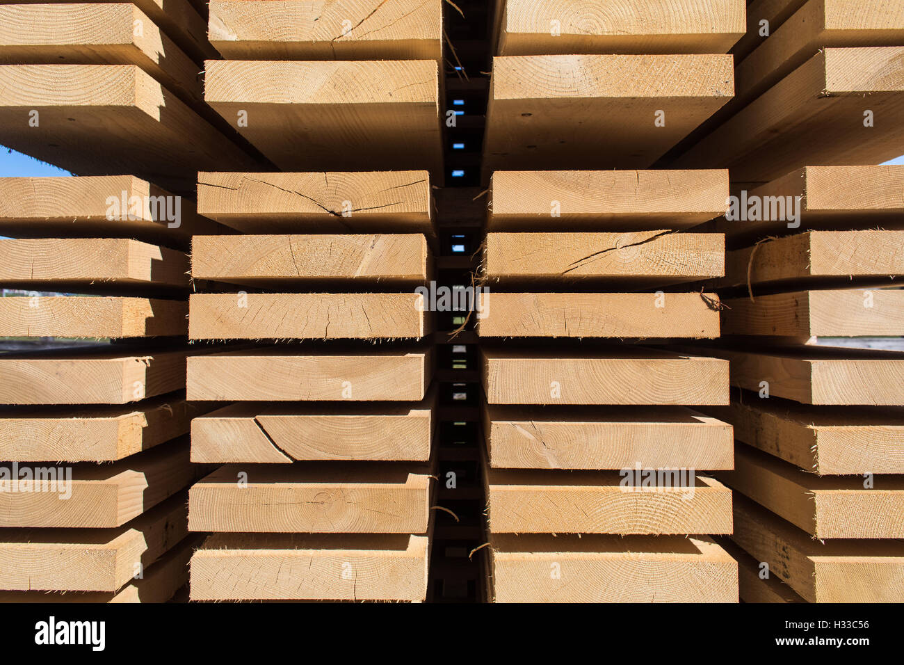 Stack of new wooden studs at the lumber yard Stock Photo - Alamy