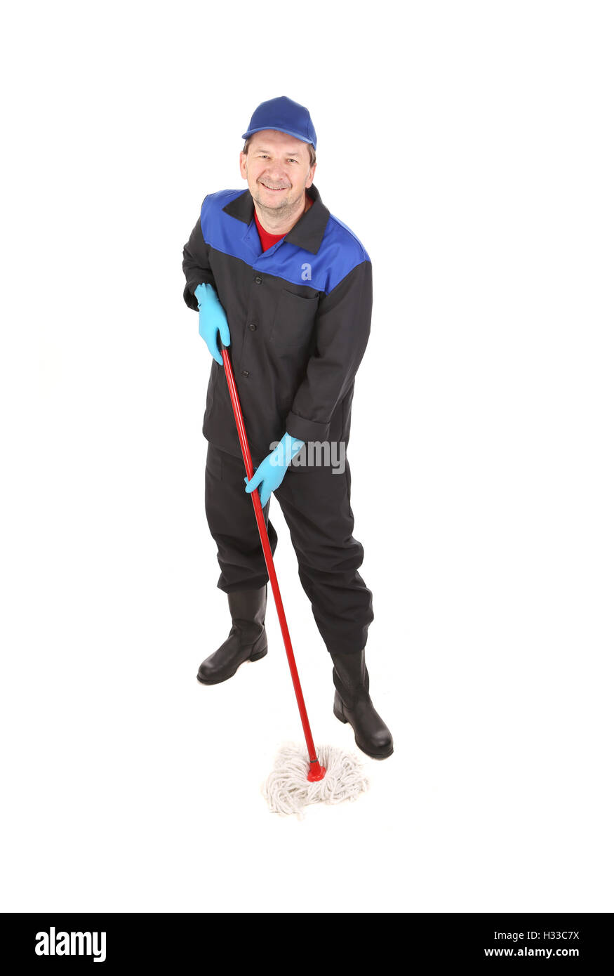 Cleaner with mop Stock Photo - Alamy