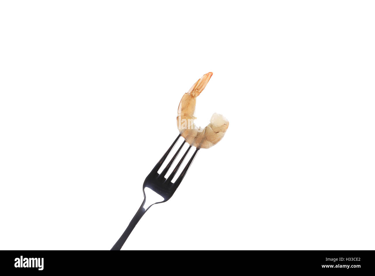 Shrimp on fork Stock Photo - Alamy