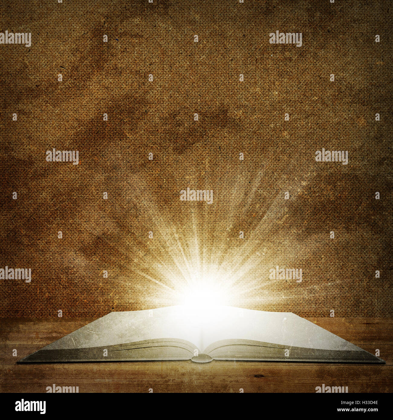 Open book lying on the floor Stock Photo - Alamy