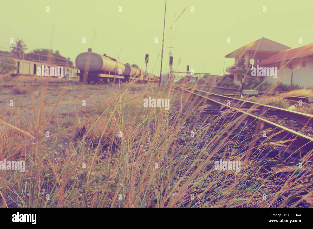 Old railway station with retro filter effect Stock Photo - Alamy