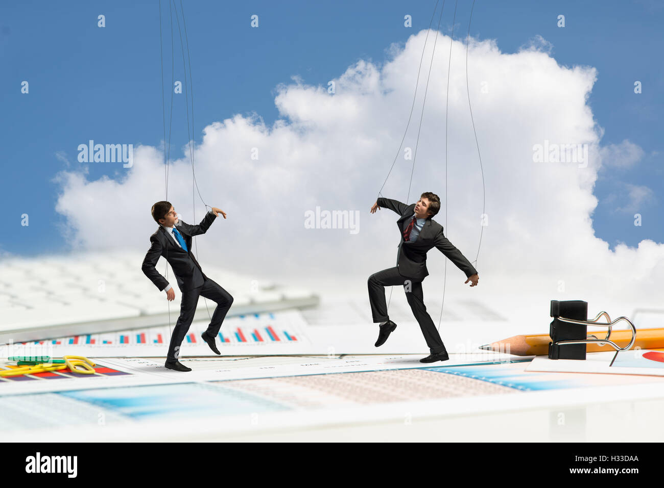 Business doll puppets on the desk Stock Photo - Alamy