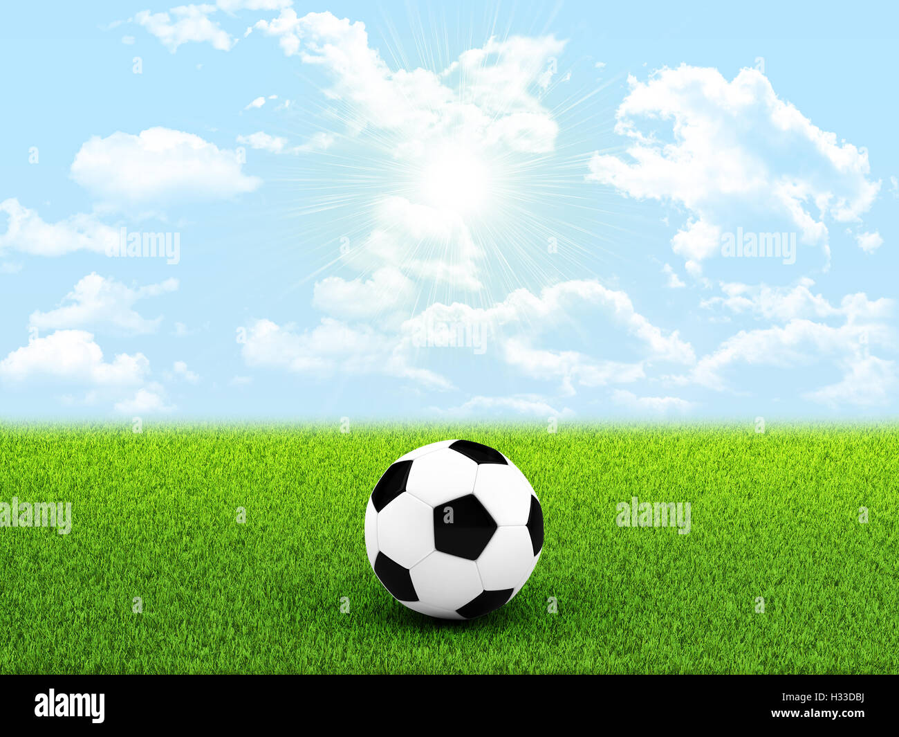 Soccer ball in the middle of field Stock Photo - Alamy