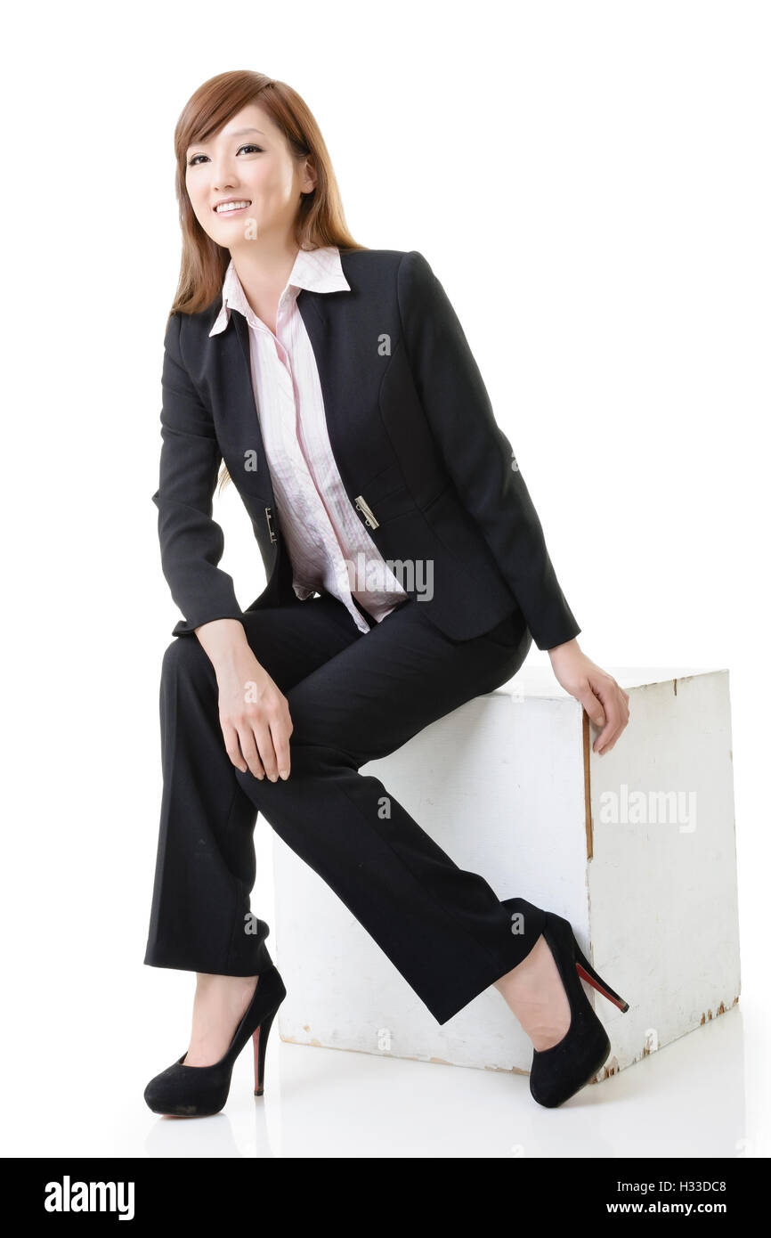 business woman sitting position Stock Photo - Alamy