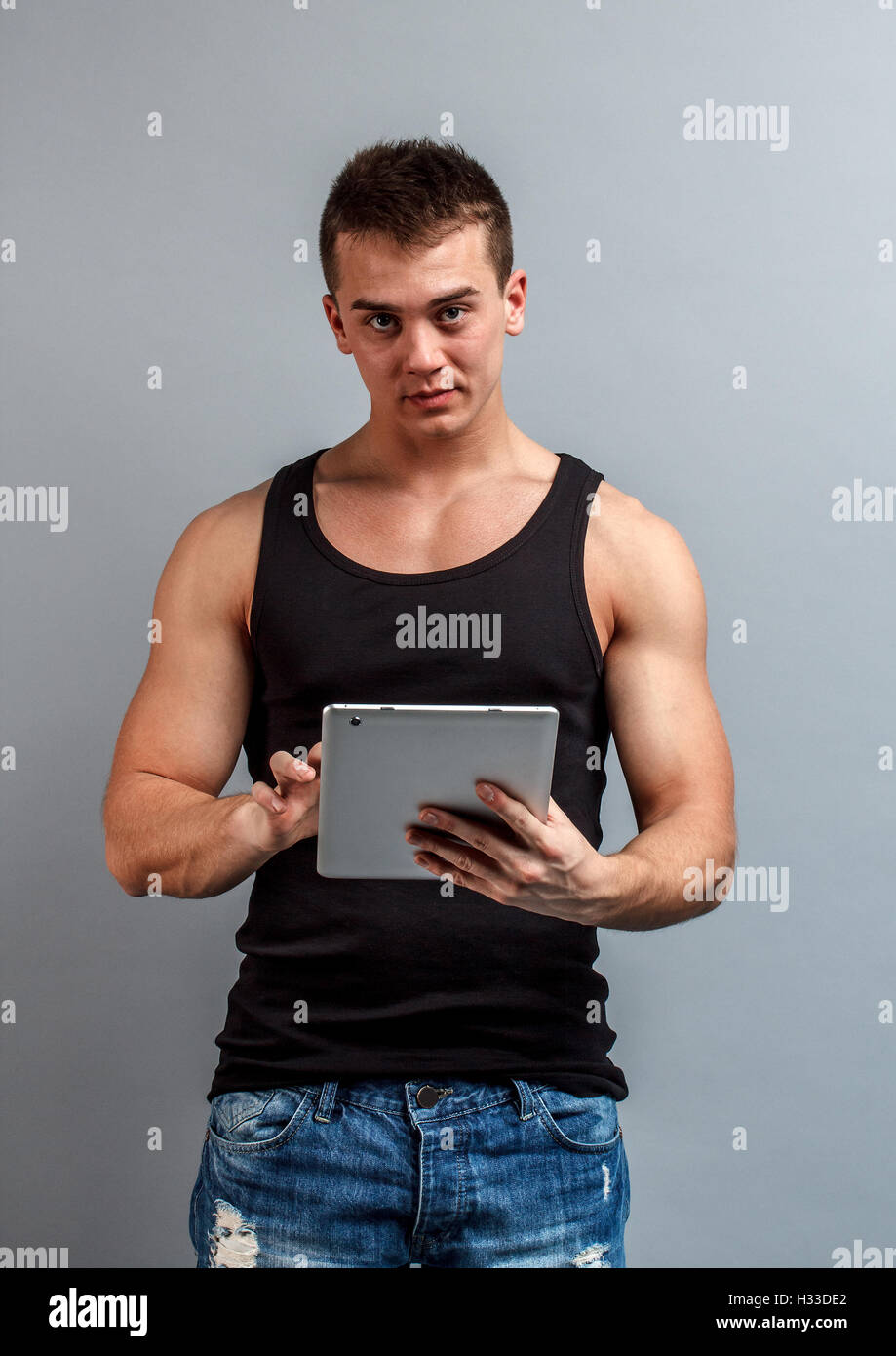 Man with tablet Stock Photo - Alamy