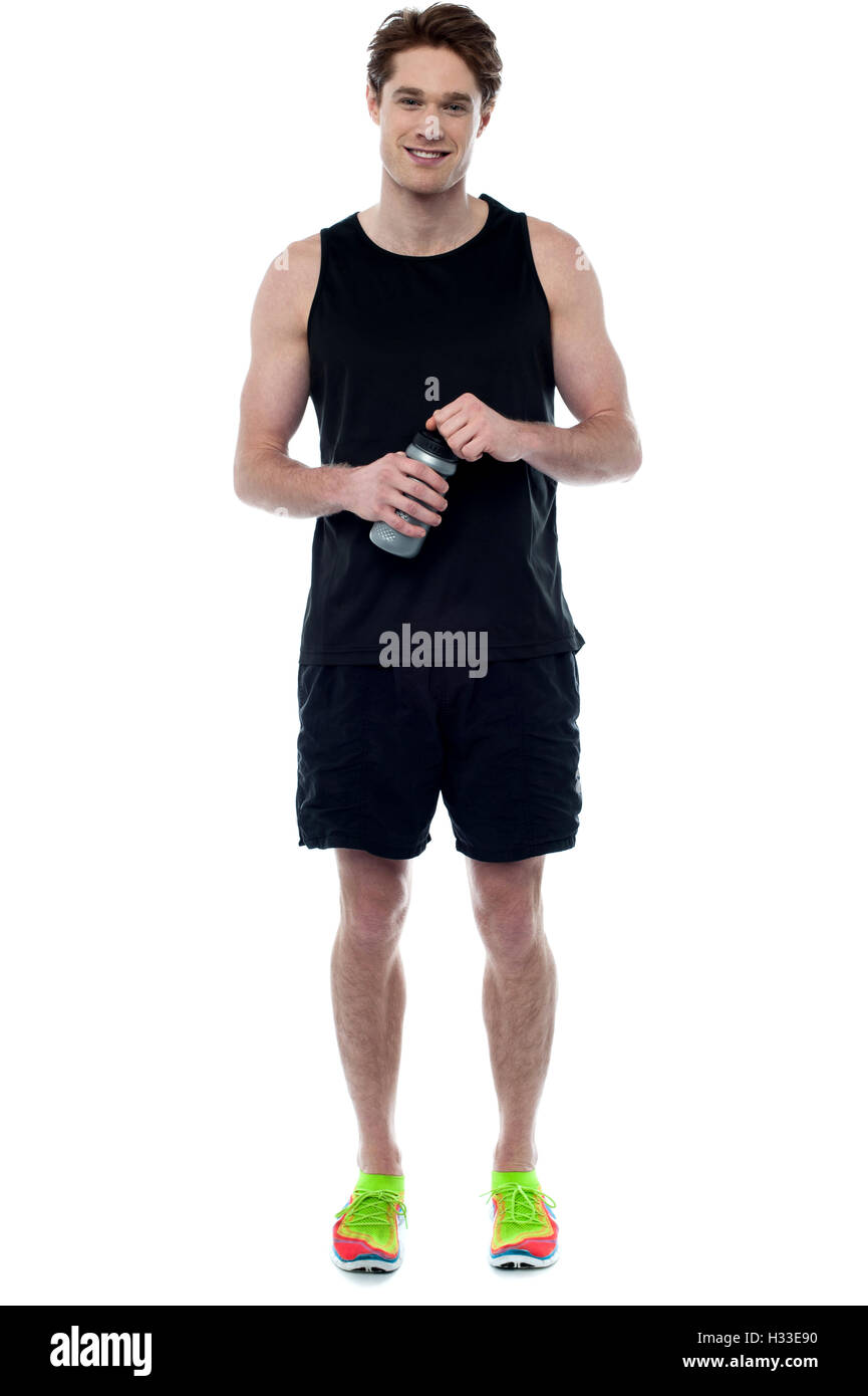 Young man in sports outfit Stock Photo - Alamy