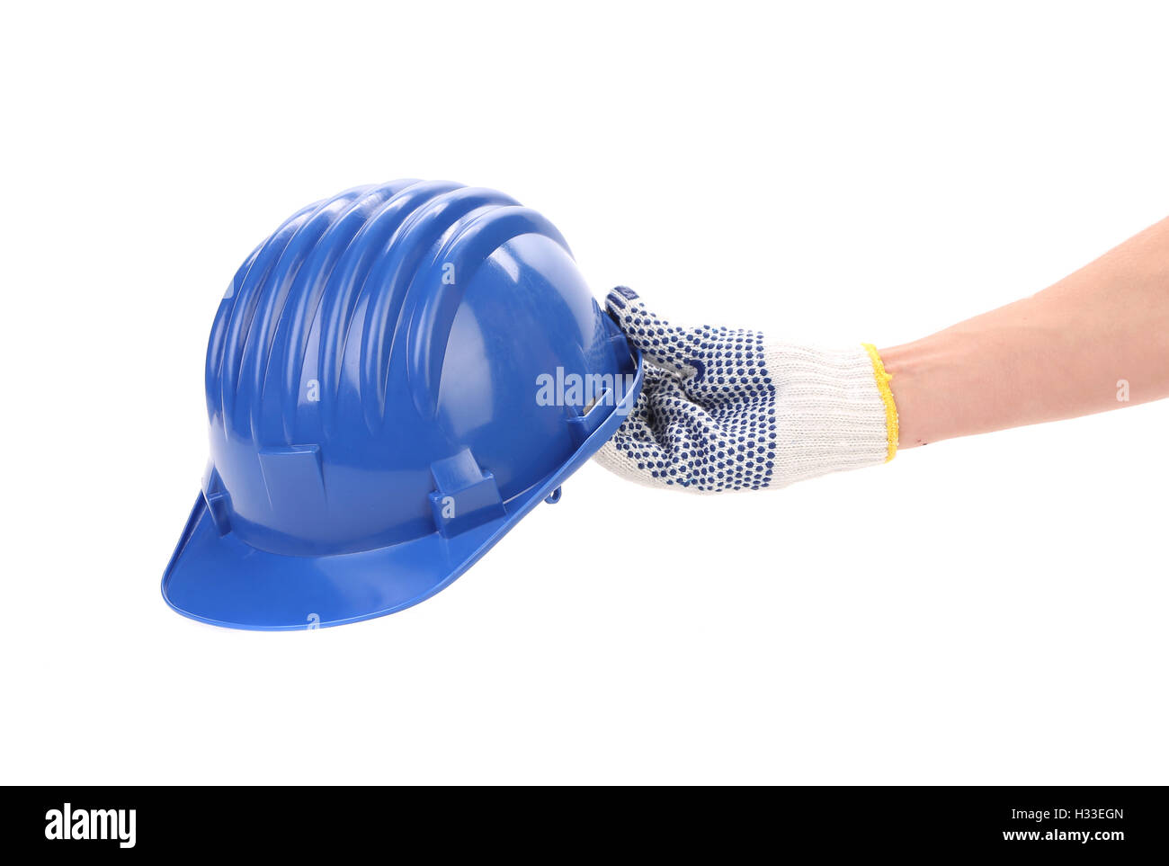 Hand holding blue helmet Stock Photo - Alamy