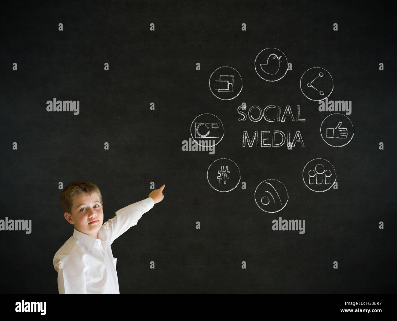 Pointing boy business man with social media icons Stock Photo - Alamy