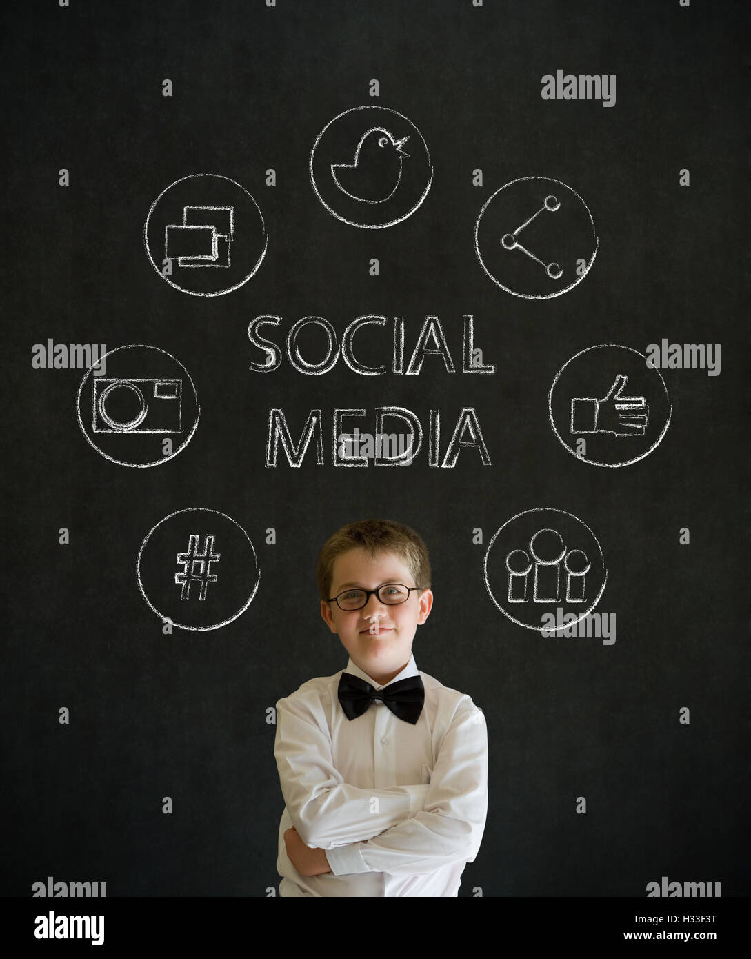 Thinking boy business man with social media icons Stock Photo - Alamy